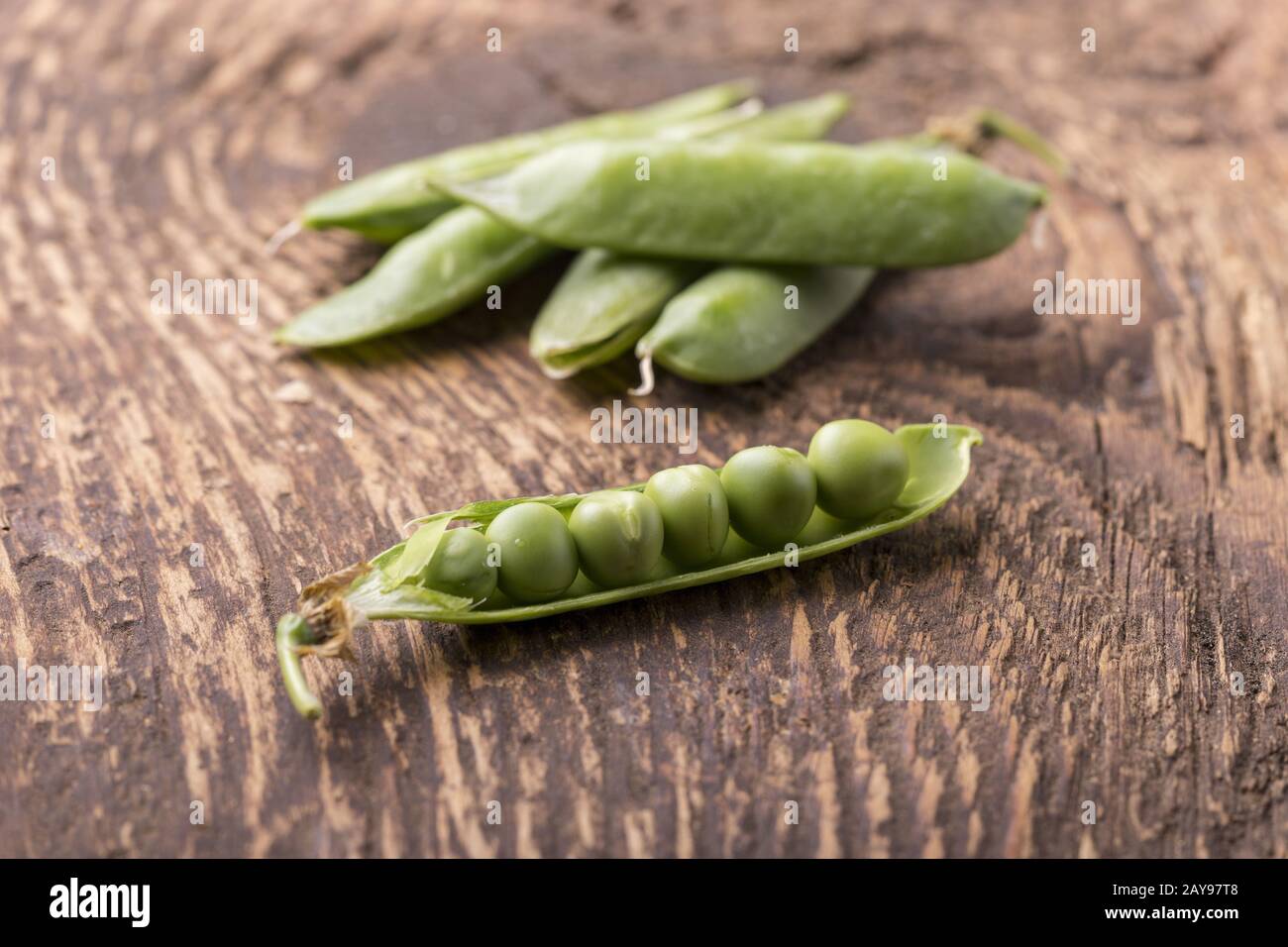 Close up of an open raw pea Stock Photo - Alamy