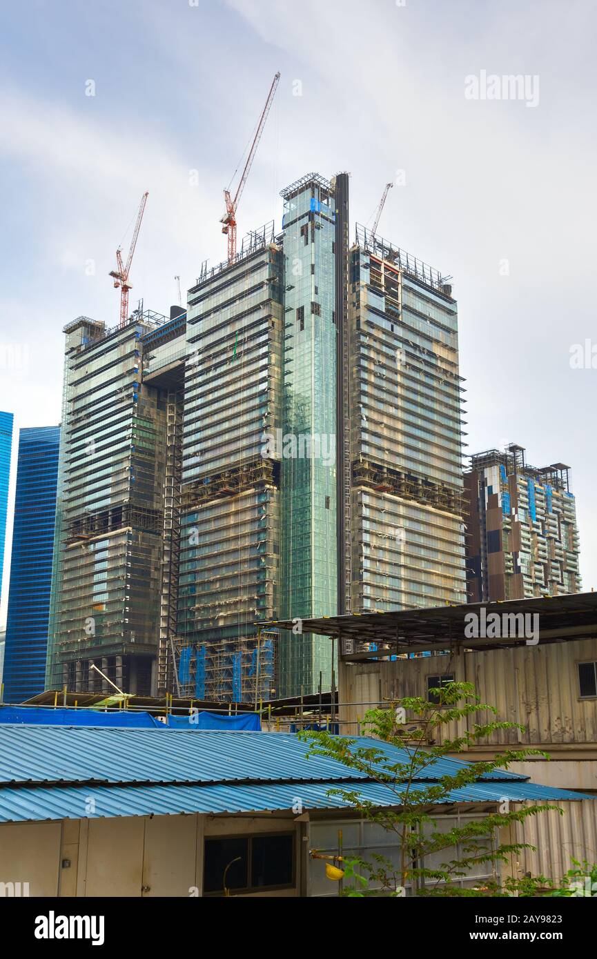 cranes at skyscraper construction site Stock Photo - Alamy