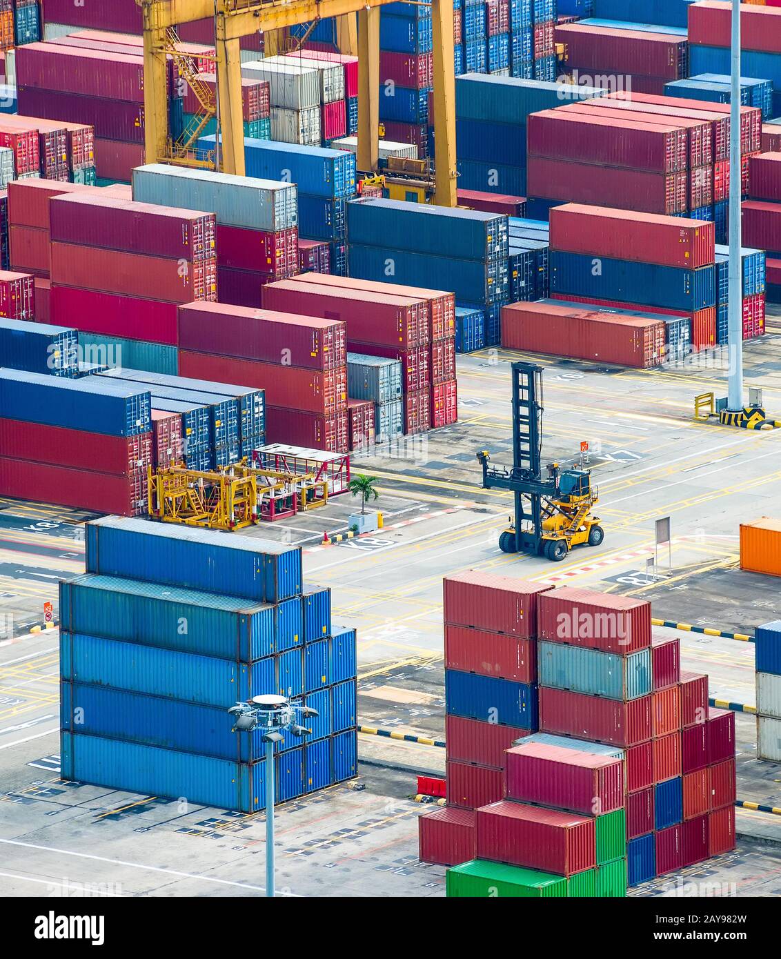 Freight containers in commercial port Stock Photo - Alamy