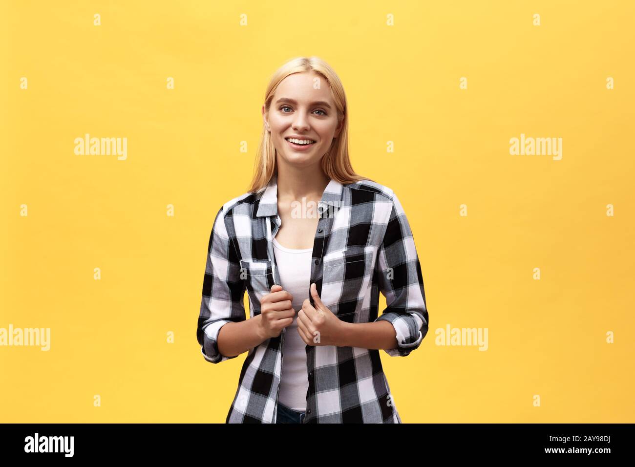 Portrait of beautiful blond girl smiling looking at camera Stock Photo ...