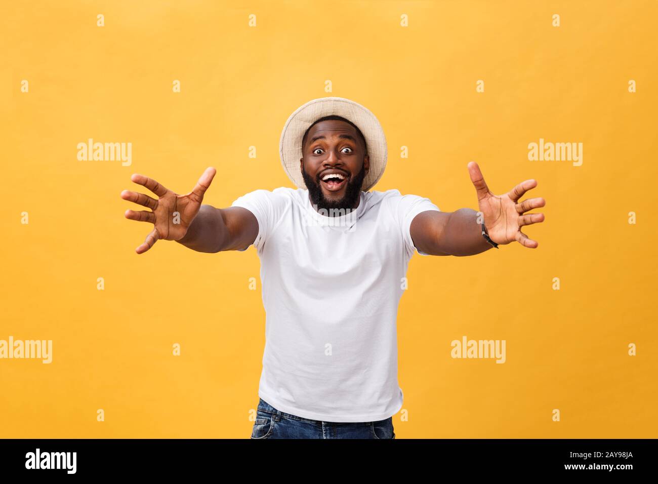 Come in my arms. Portrait of joyful friendly and happy handsome African ...