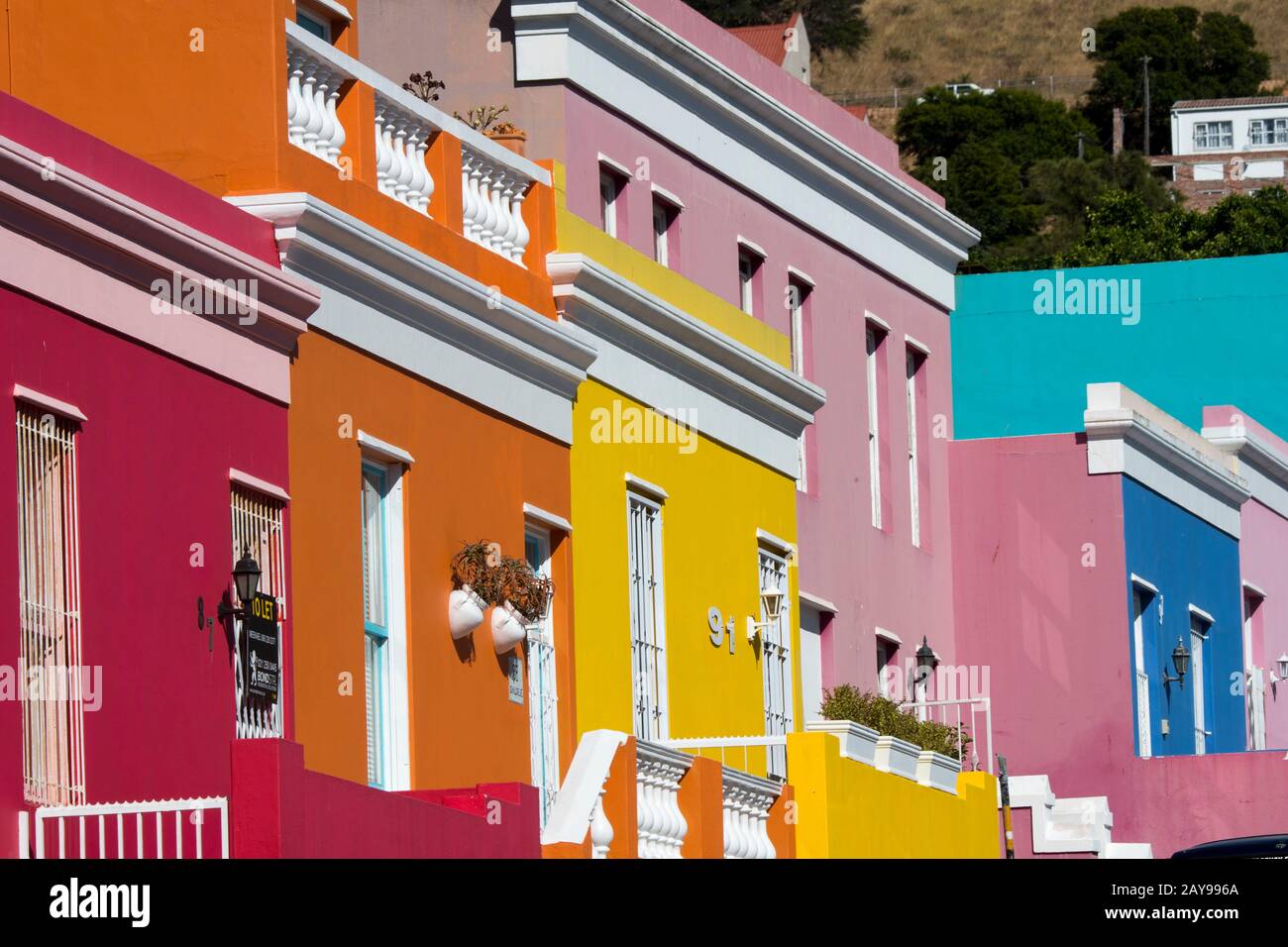 Brightly colored houses in the Bo-Kaap (Upper Cape) neighborhood of ...