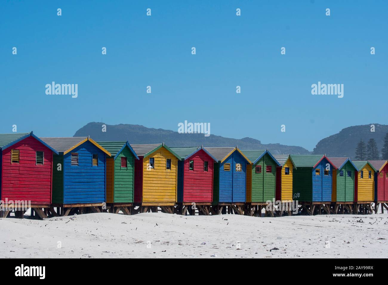 View of colorful beach changing huts on the beach at Muizenberg, a ...