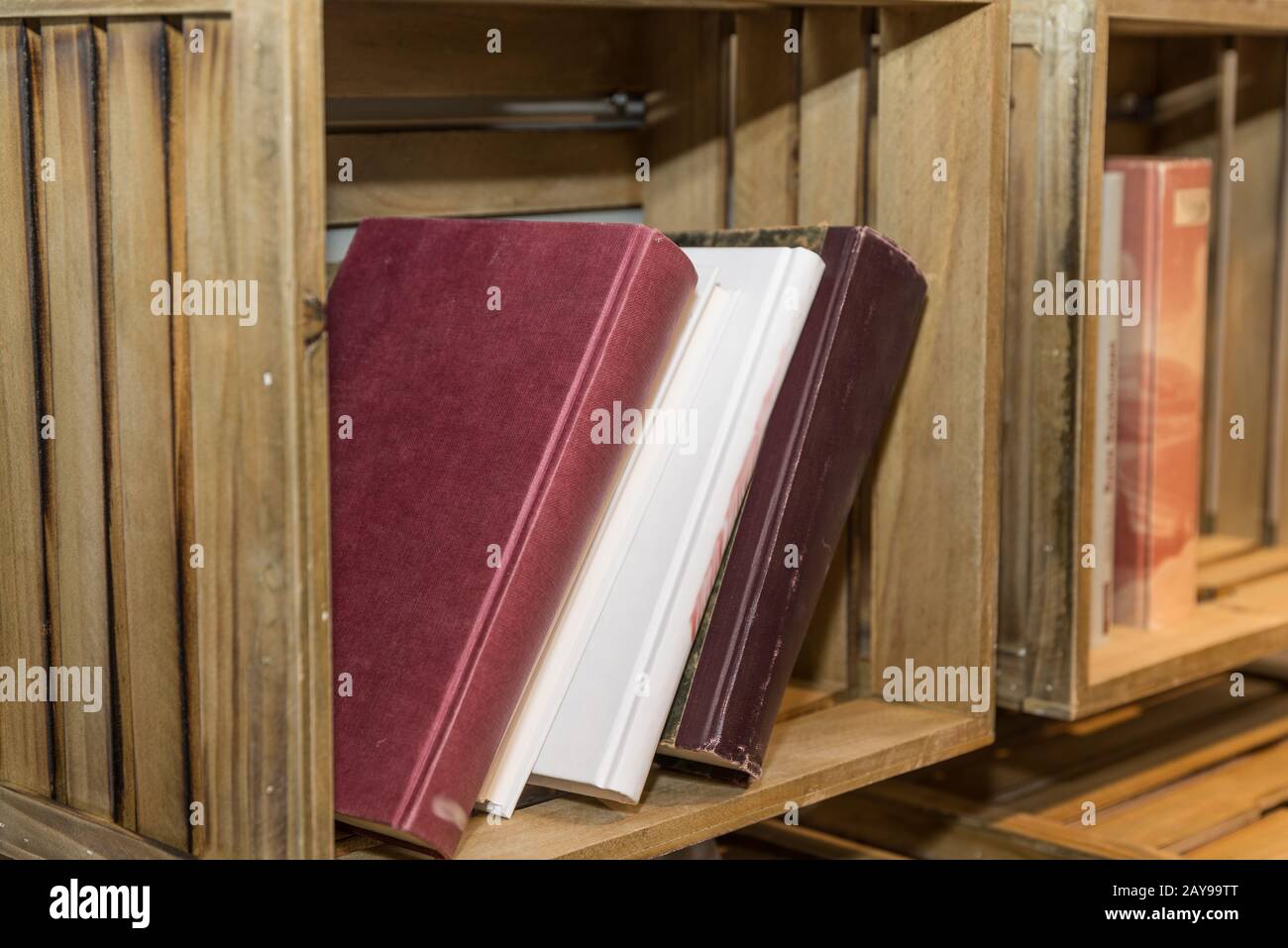rustic bookshelf with wooden boxes - closeup stylish shelf Stock Photo ...