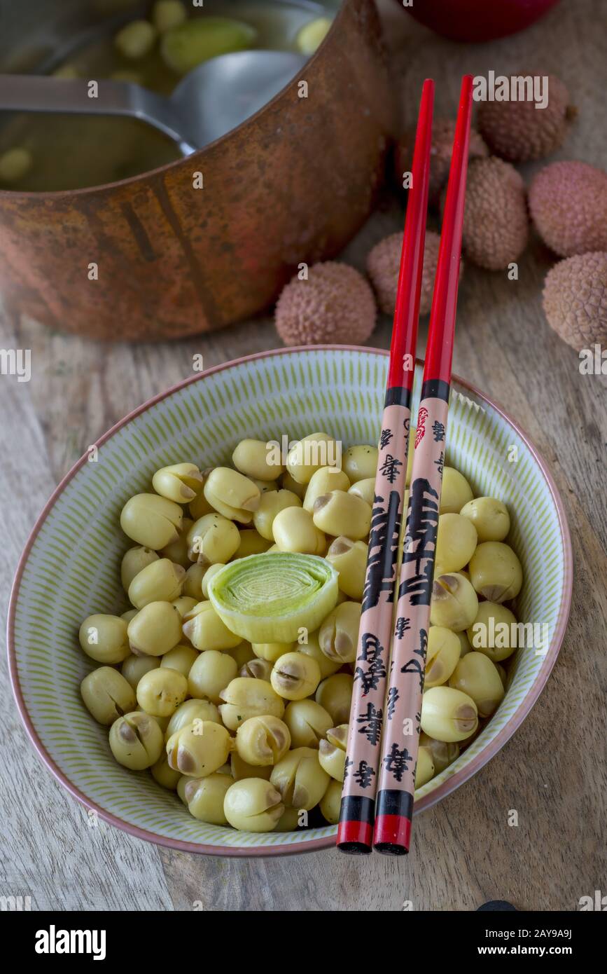 Cooked lotus seeds Stock Photo - Alamy