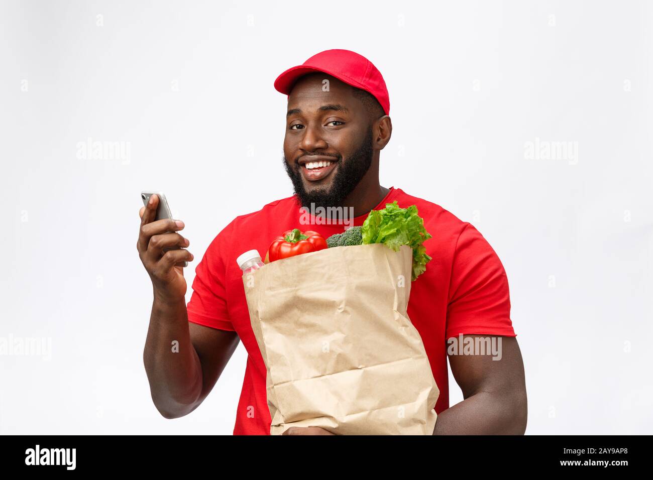 Delivery Concept - Portrait of Handsome African American delivery man ...