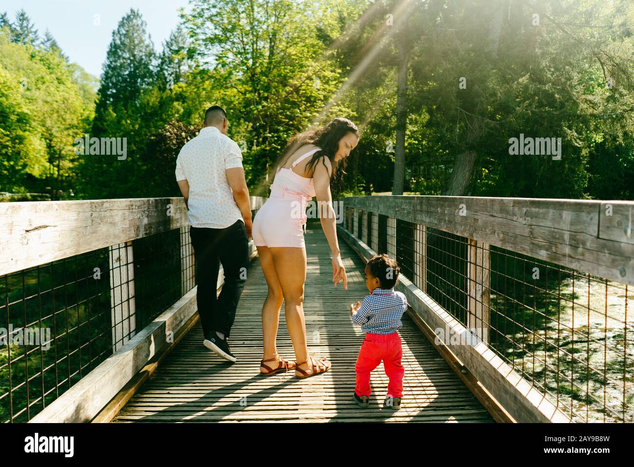 Mother three children from behind hi-res stock photography and images ...