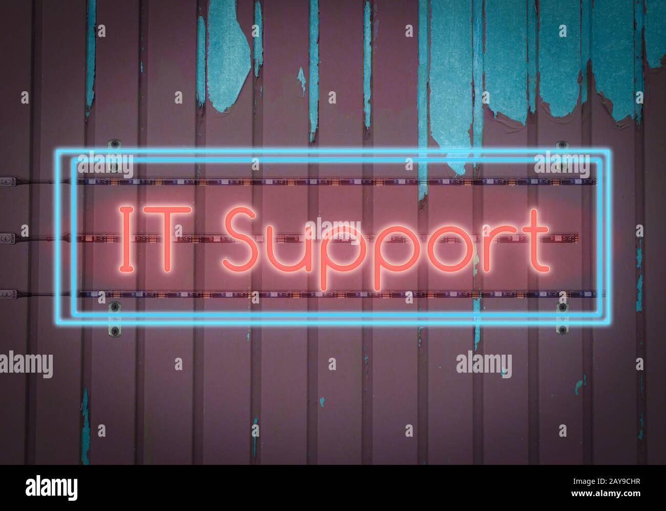 Neon light at the iron gate with the word IT Support Stock Photo - Alamy