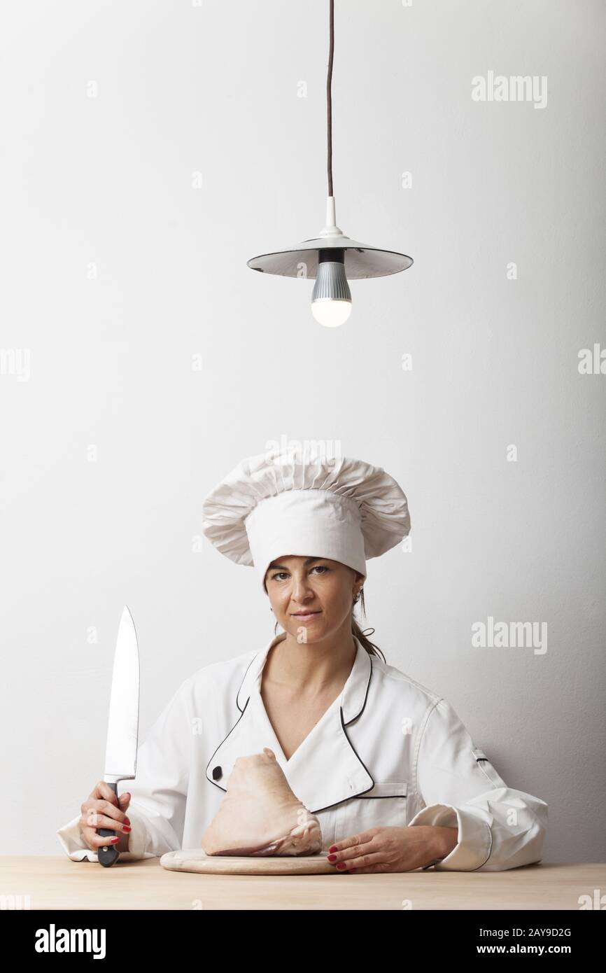 Cook with a knife Stock Photo - Alamy