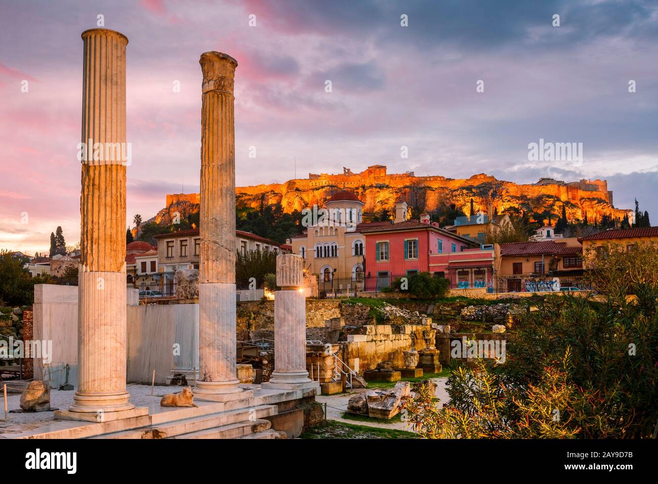 Remains of Hadrian's Library and Acropolis in the old town of Athens ...