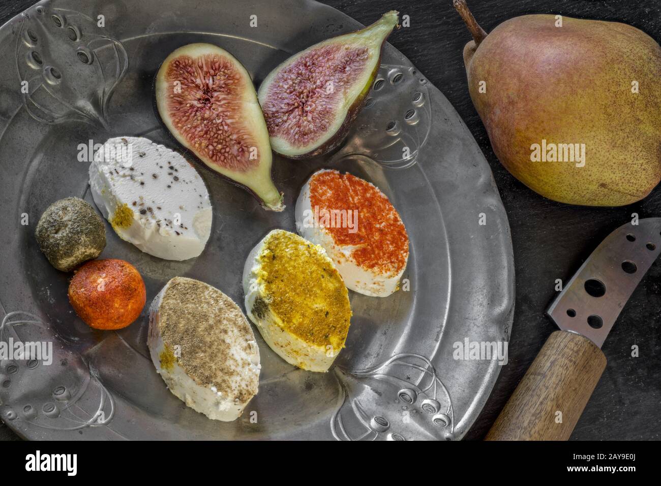 French fresh cheeses with herbs and spices Stock Photo - Alamy