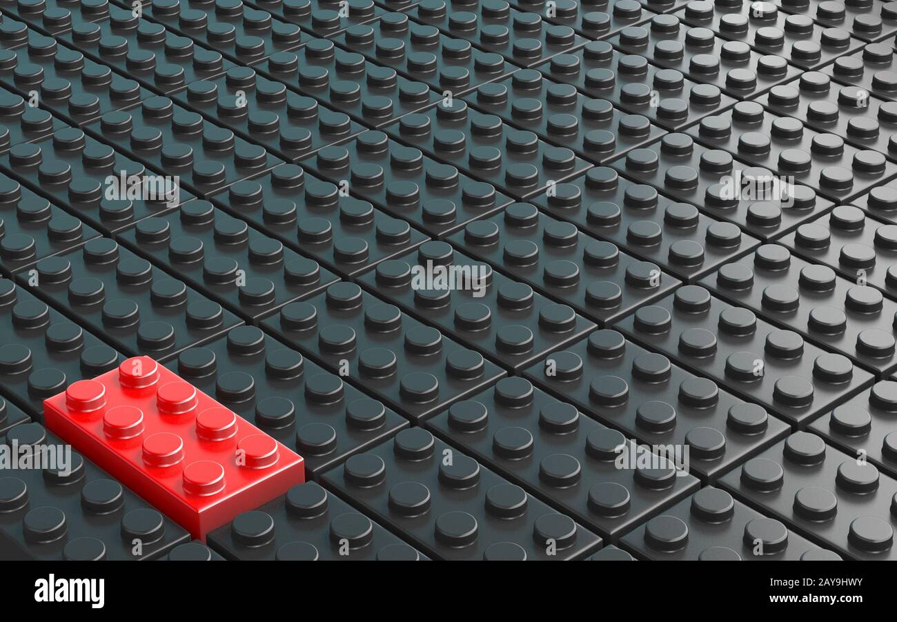One red plastic brick toy on background made of black plastic bricks 3D ...