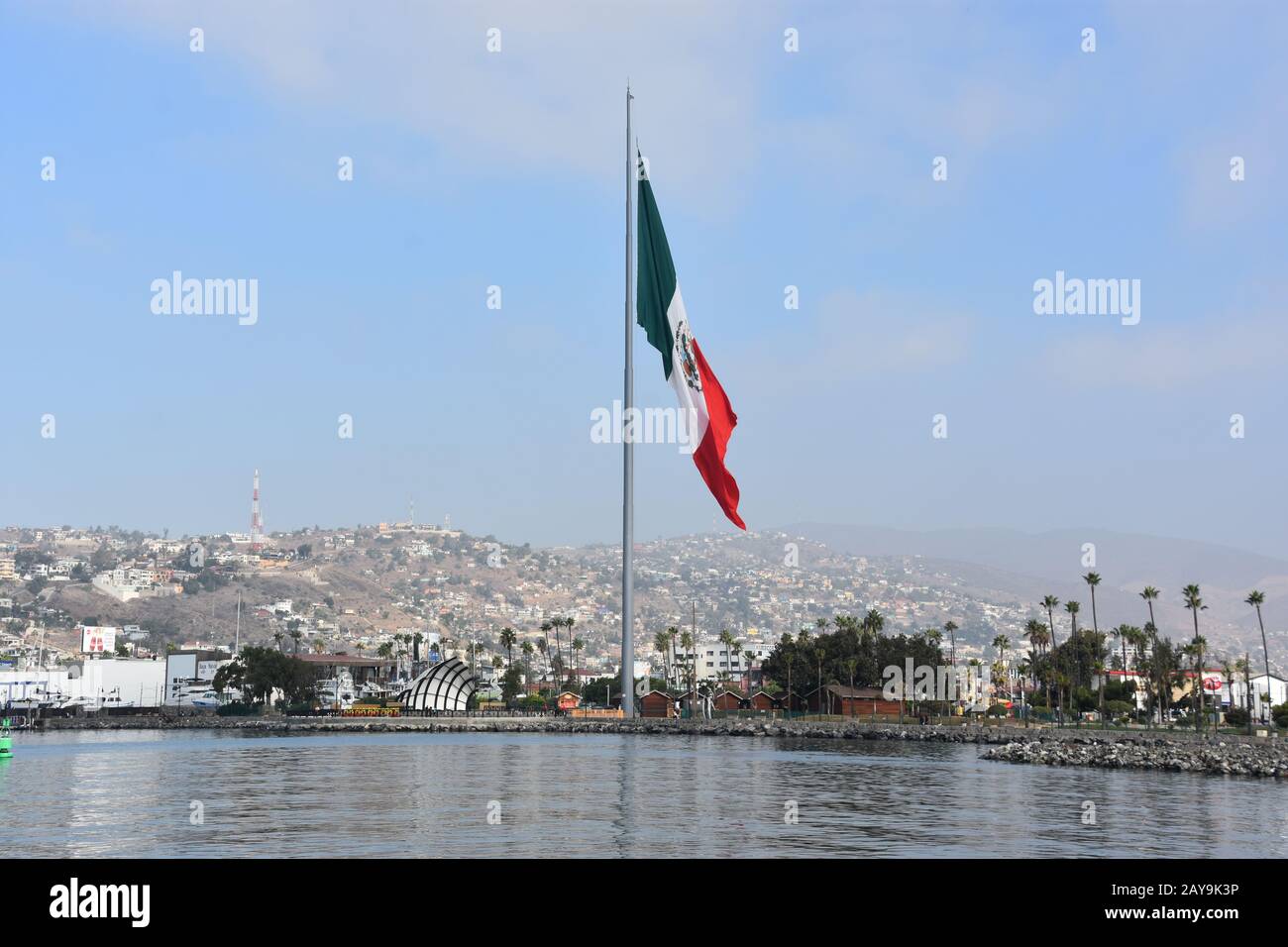 Mexican flag hoisted at the Port of Ensenada in Mexico Stock Photo - Alamy