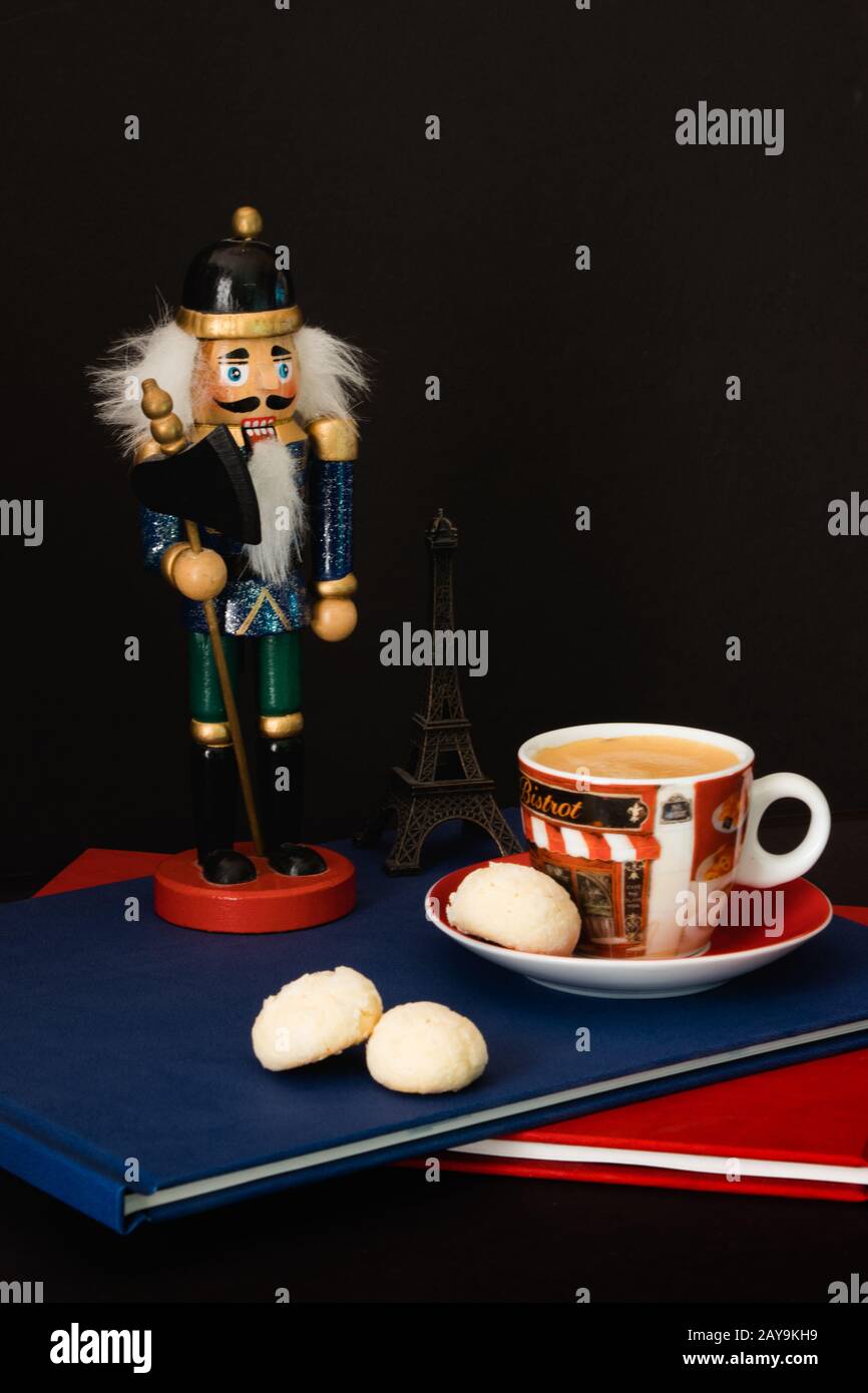Christmas Still life with nutcracker, cookies, coffee cup and Blue and ...
