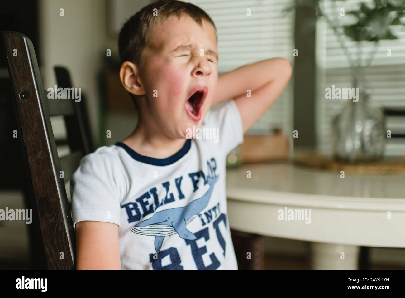 Yawning boy hi-res stock photography and images - Alamy