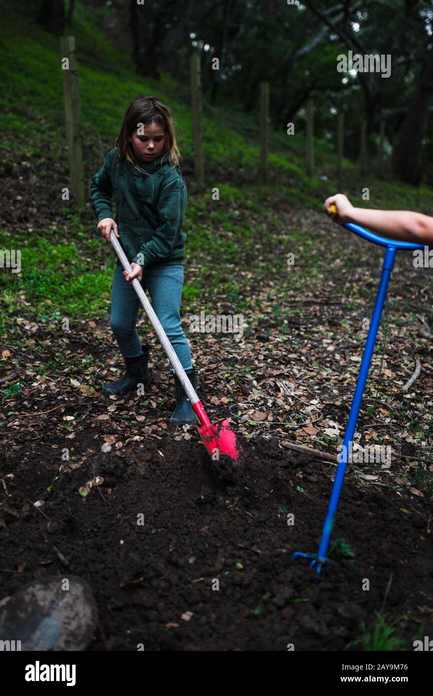 Children digging in dirt hi-res stock photography and images - Alamy