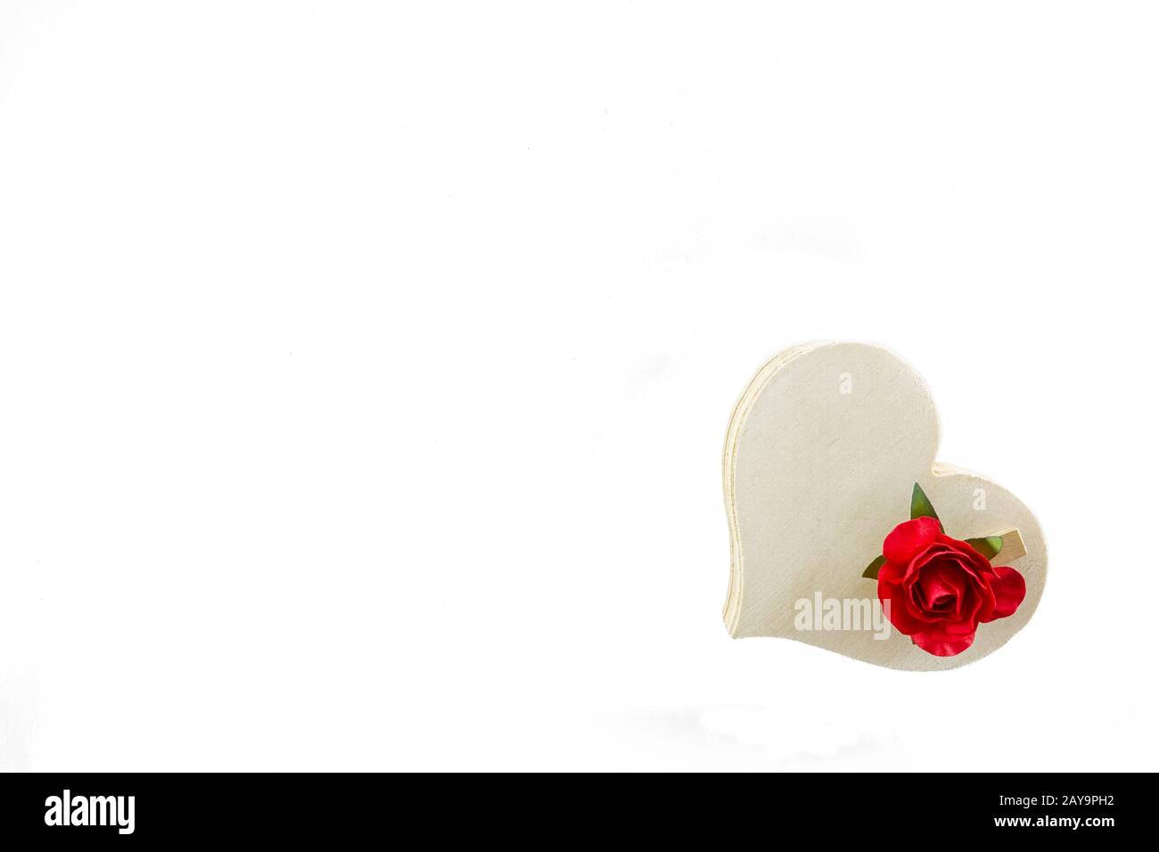 Red rose on hearts Cut Out Stock Images & Pictures - Alamy