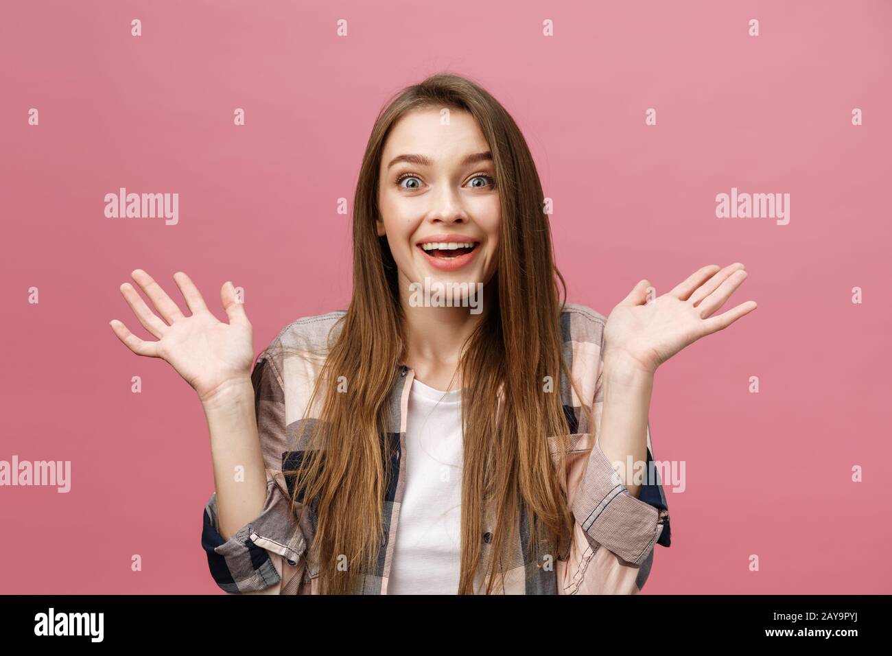Surprised happy beautiful woman looking in excitement. Isolate over ...