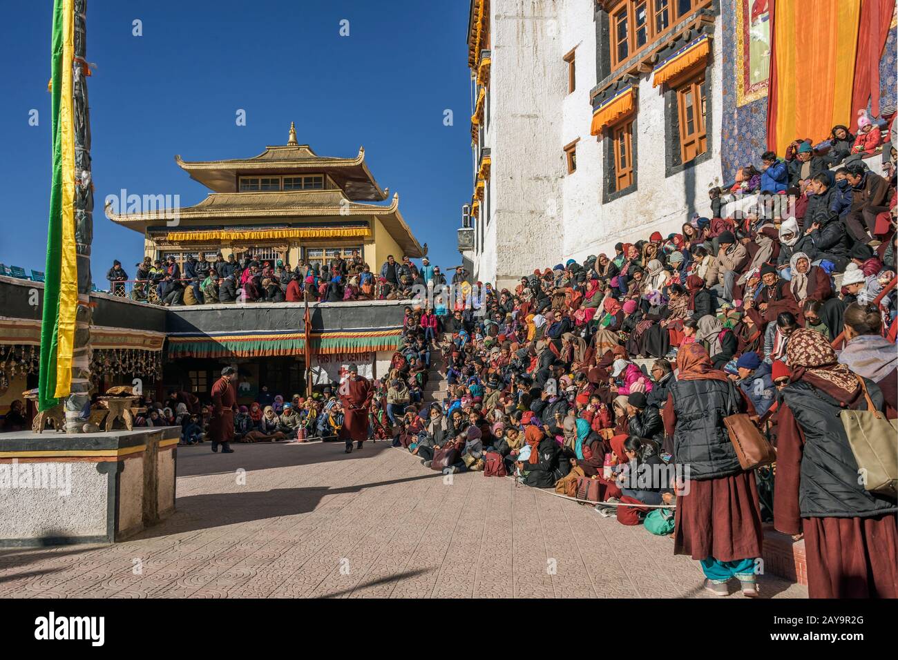 Huge number of festival goers cram the courtyard of Spituk Gompa for ...