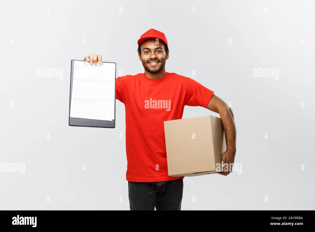 Delivery Concept - Portrait of Handsome African American delivery man ...