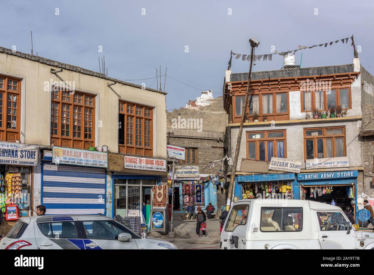 Looking up towards Red Maitreya temple from the Leh Bazaar, Leh, Ladakh ...