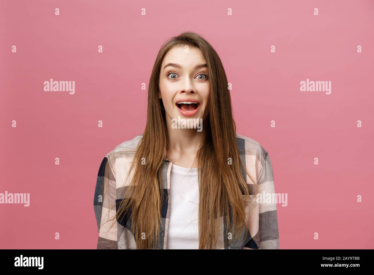 Surprised happy beautiful woman looking in excitement. Isolate over ...