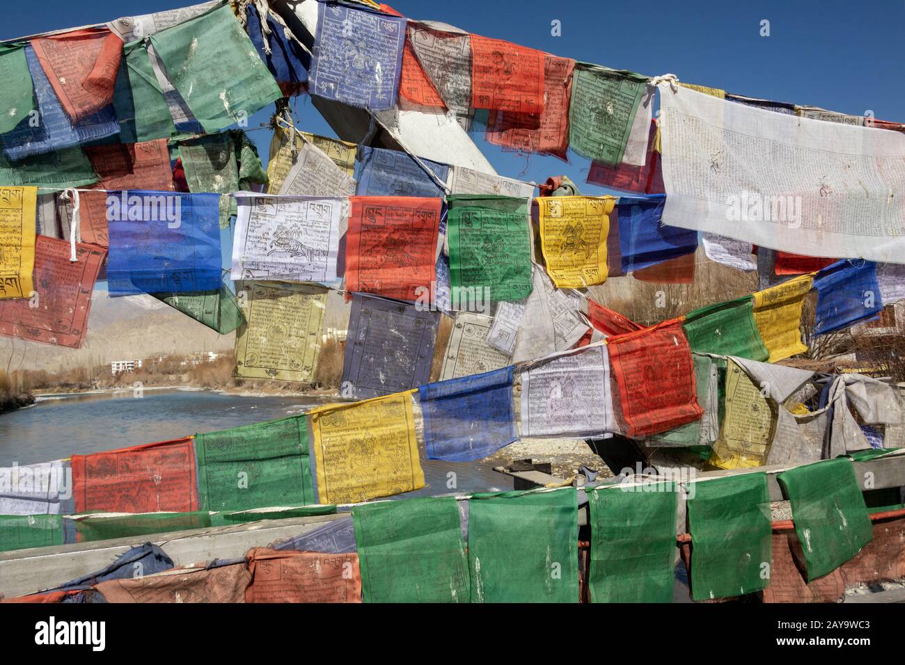 Prayer flags on the Chuckhot Rd bridge across the Indus River, Leh ...