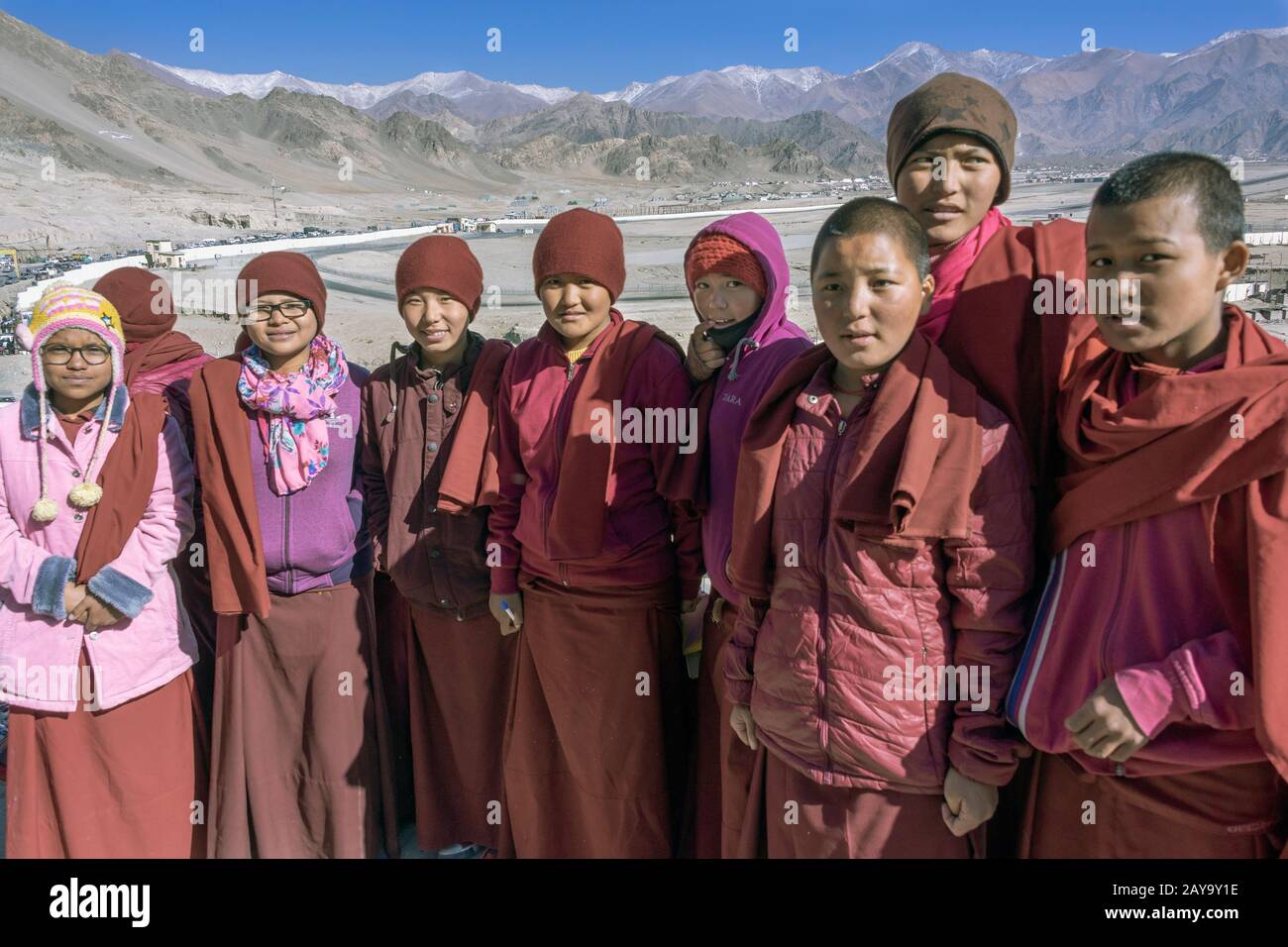 Group of monks posing at Spituk Gompa at the Gustor festival, Ladakh ...