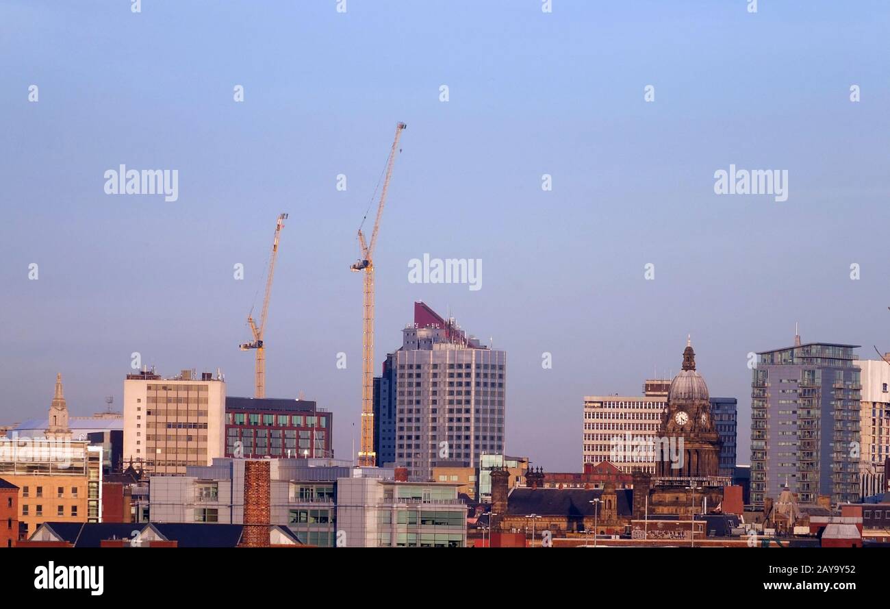 A long cityscape panoramic view of leeds showing the town hall offices ...