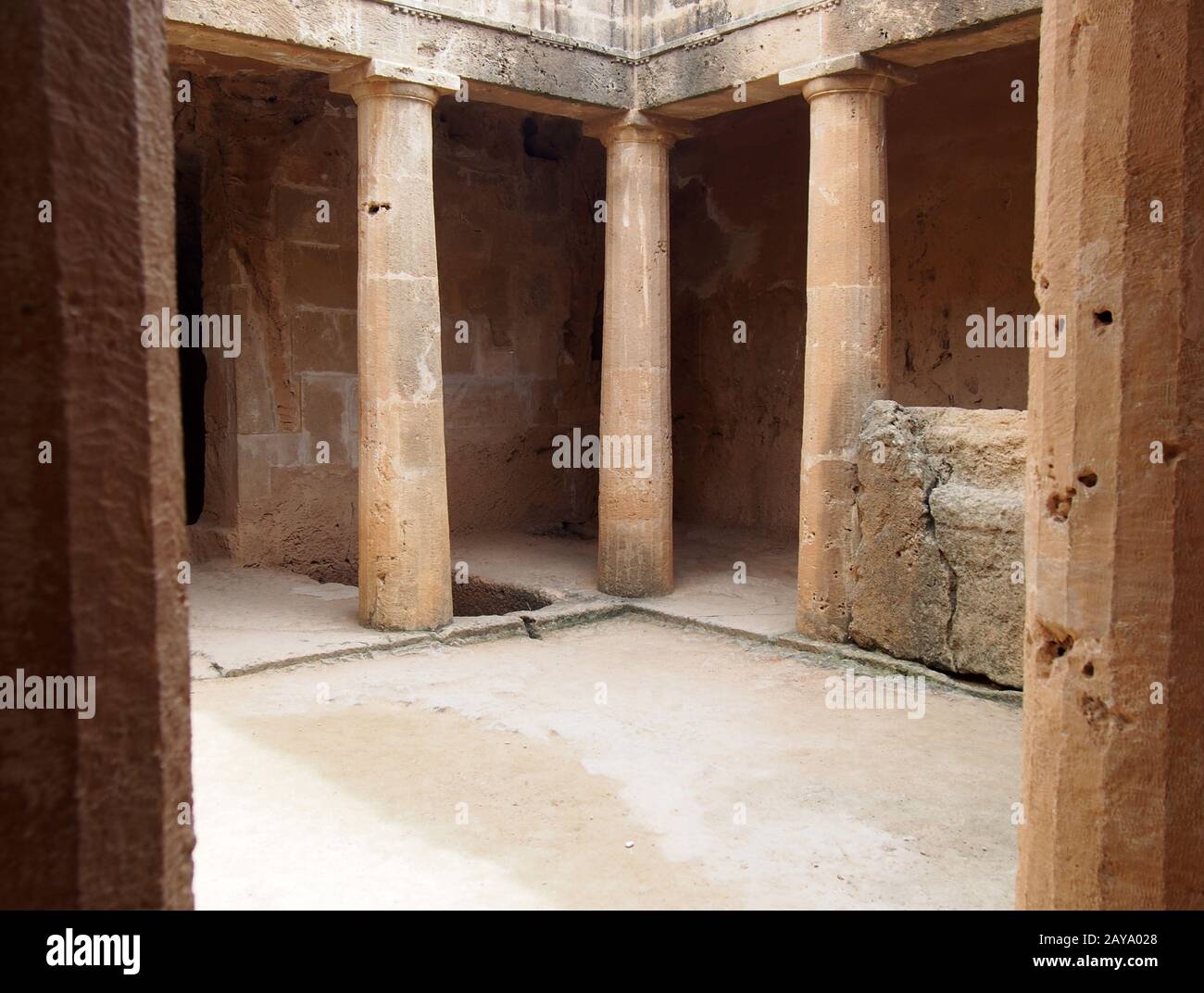 columns in an underground tomb in paphos cyprus Stock Photo - Alamy