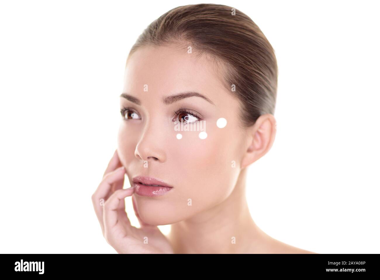 Eye cream face skin care woman putting eyebag wrinkles care anti aging ...