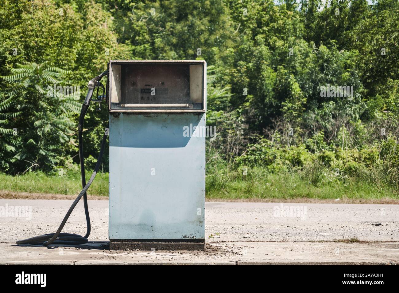 Old abandoned vintage obsolete petrol fuel gas dispenser in former ...