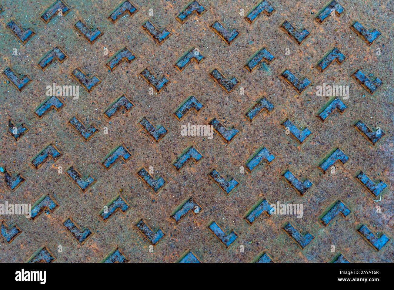 Rectangular shapes on rusted metal surface with patterns and cracks ...