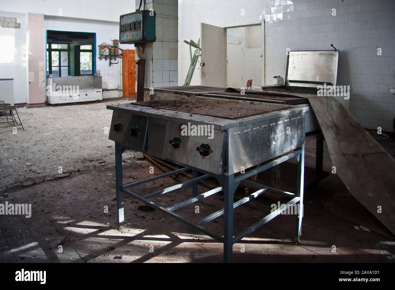 Abandoned and ruined kitchen of closed factory canteen or restaurant ...