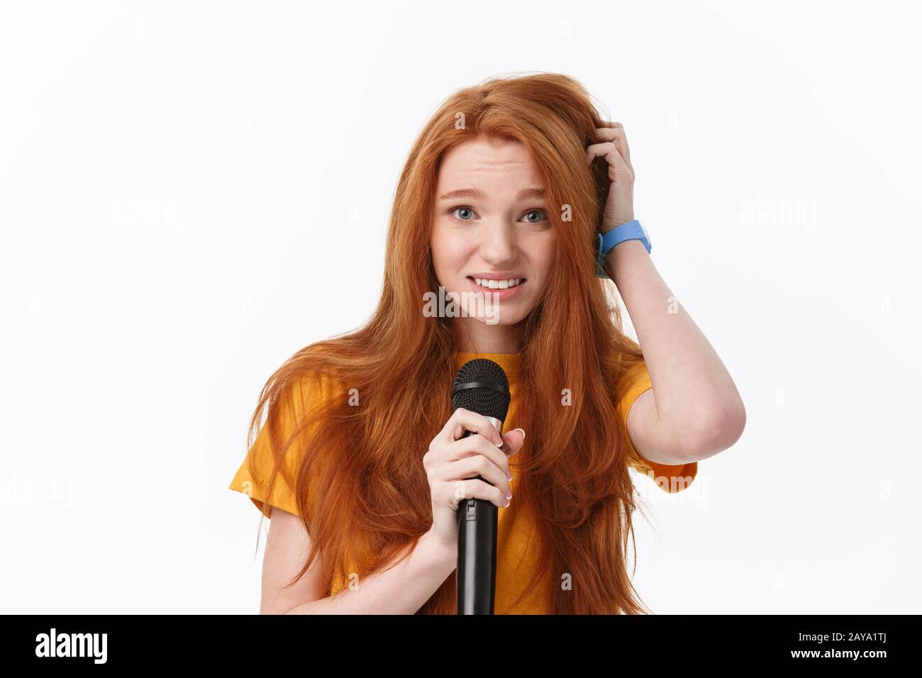 pretty woman singing with confuse and worry facial expression Stock ...