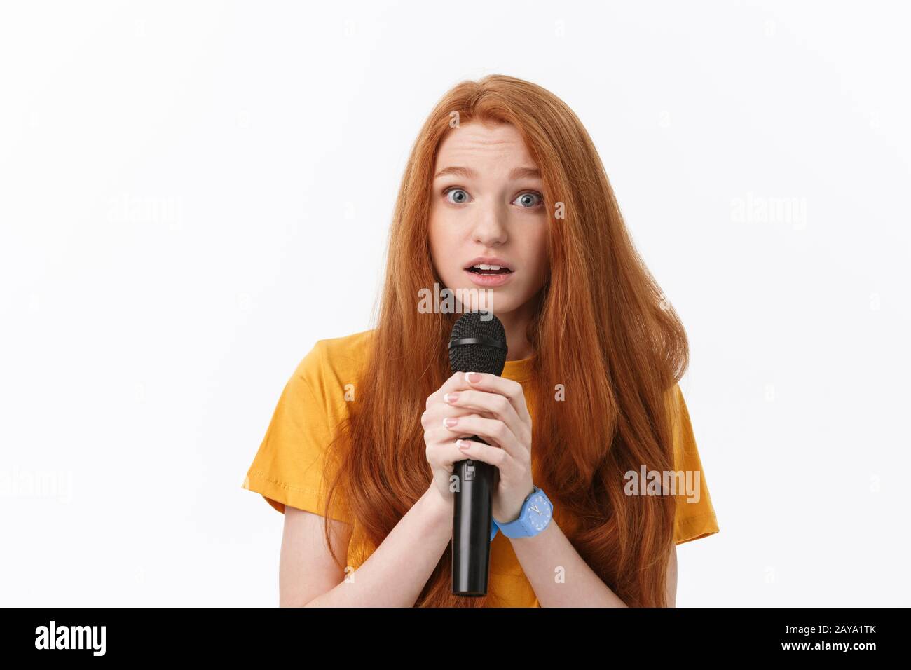 pretty woman singing with confuse and worry facial expression Stock ...