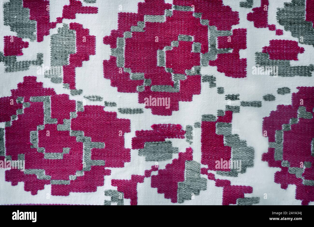 A fragment of ancient handmade fabric with drawings Stock Photo - Alamy