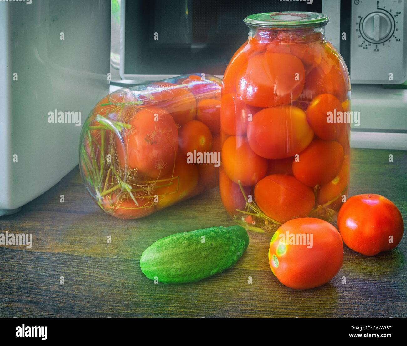Canned ripe tomatoes in large glass jars Stock Photo - Alamy