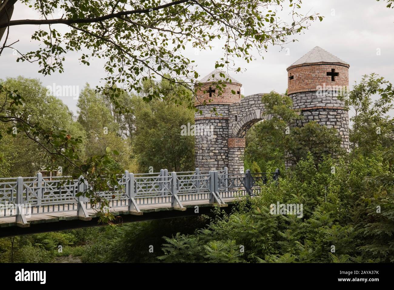 Medieval bridal bridge with stone towers and Rhus - Sumac trees in Five ...