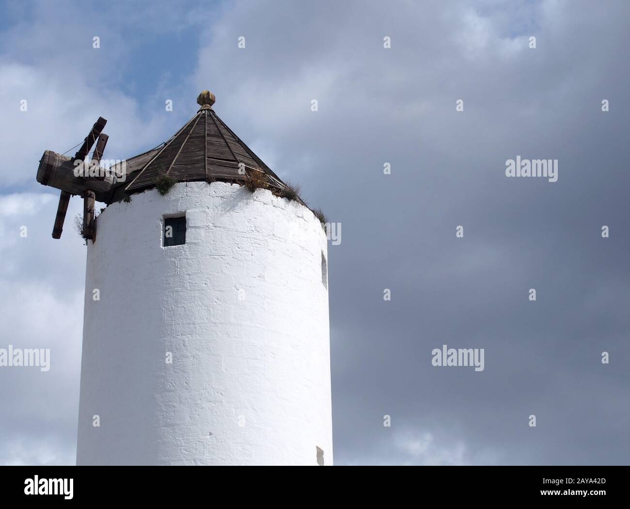 the historic old white windmill in ciutadella menorca against a blue ...