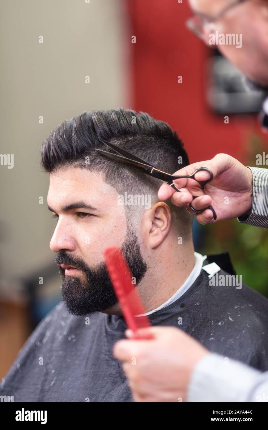 Man having hair cut salon hi-res stock photography and images - Alamy