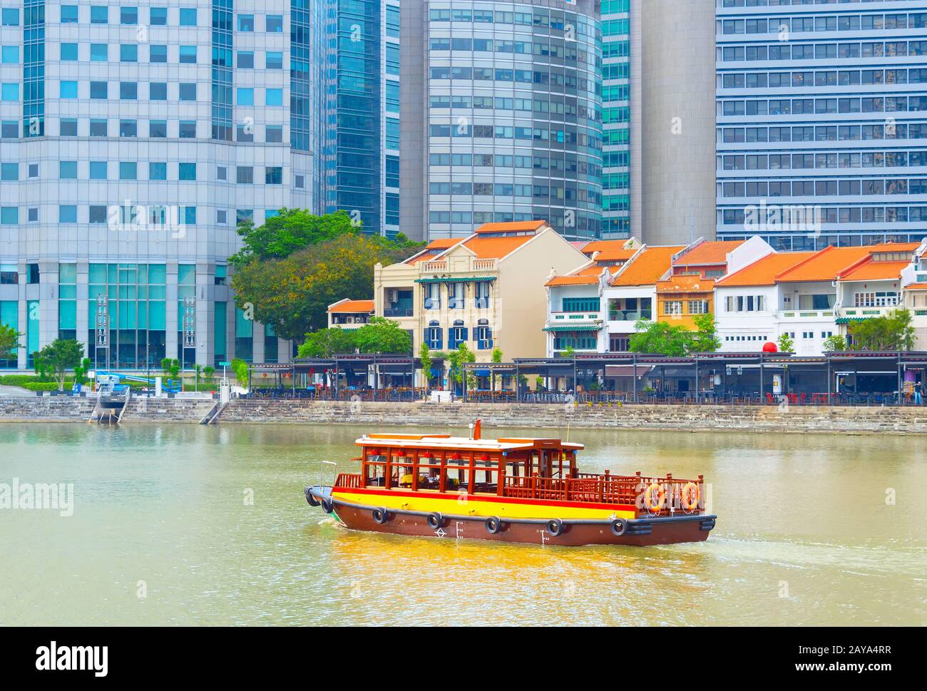 Tourist boat quay Singapore river Stock Photo - Alamy