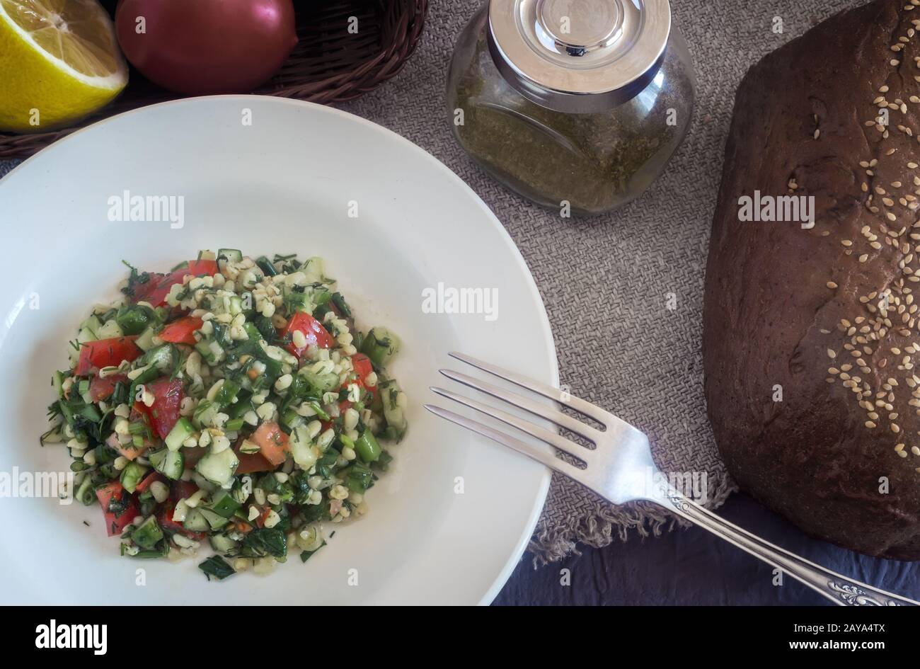 Salad Tabule - a common dish of Arabic cuisine Stock Photo - Alamy
