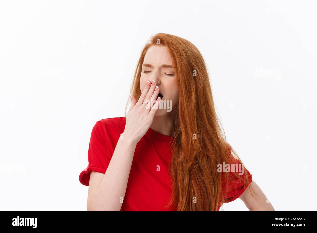 Young cute woman tired and very sleepy isolate over white background ...