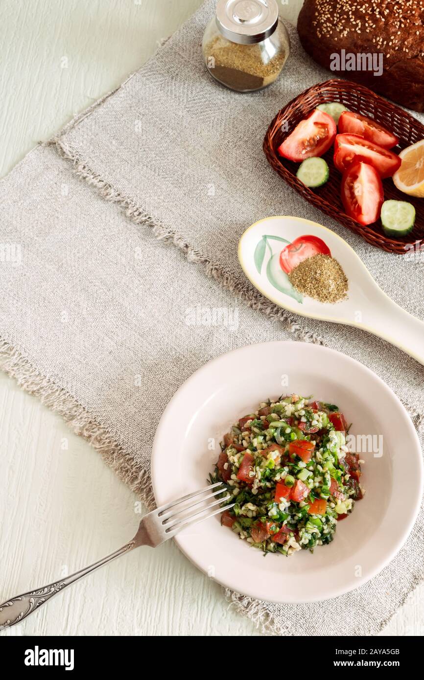 Salad Tabule - a common dish of Arabic cuisine Stock Photo - Alamy
