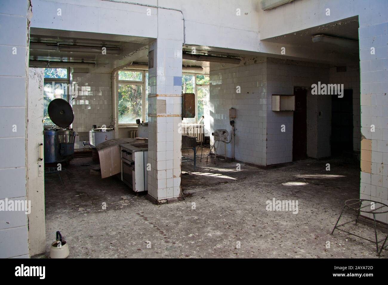 Abandoned and ruined kitchen of closed factory canteen or restaurant ...