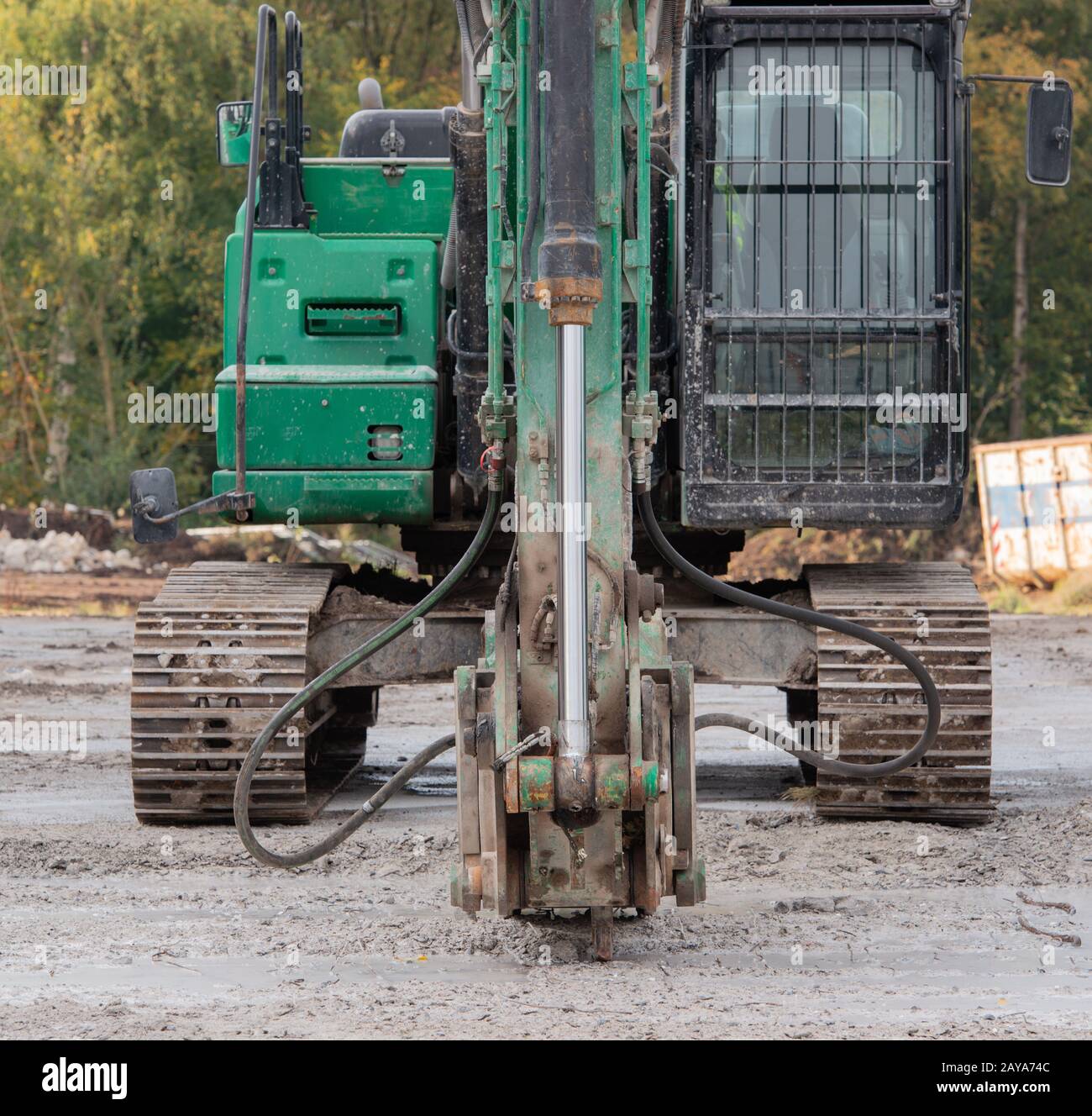 Building demolition with a demolition excavator on a building site ...