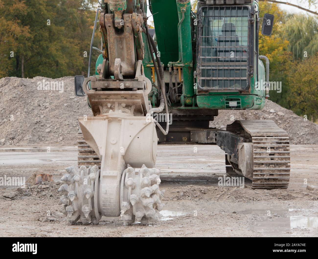 Building demolition with a demolition excavator on a building site ...
