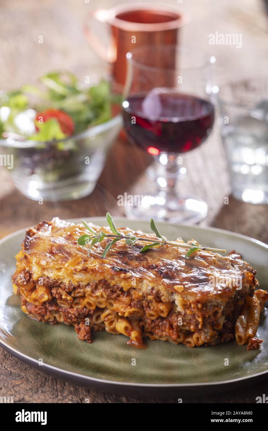 Greek Pastizio pasta dish with cheese Stock Photo - Alamy