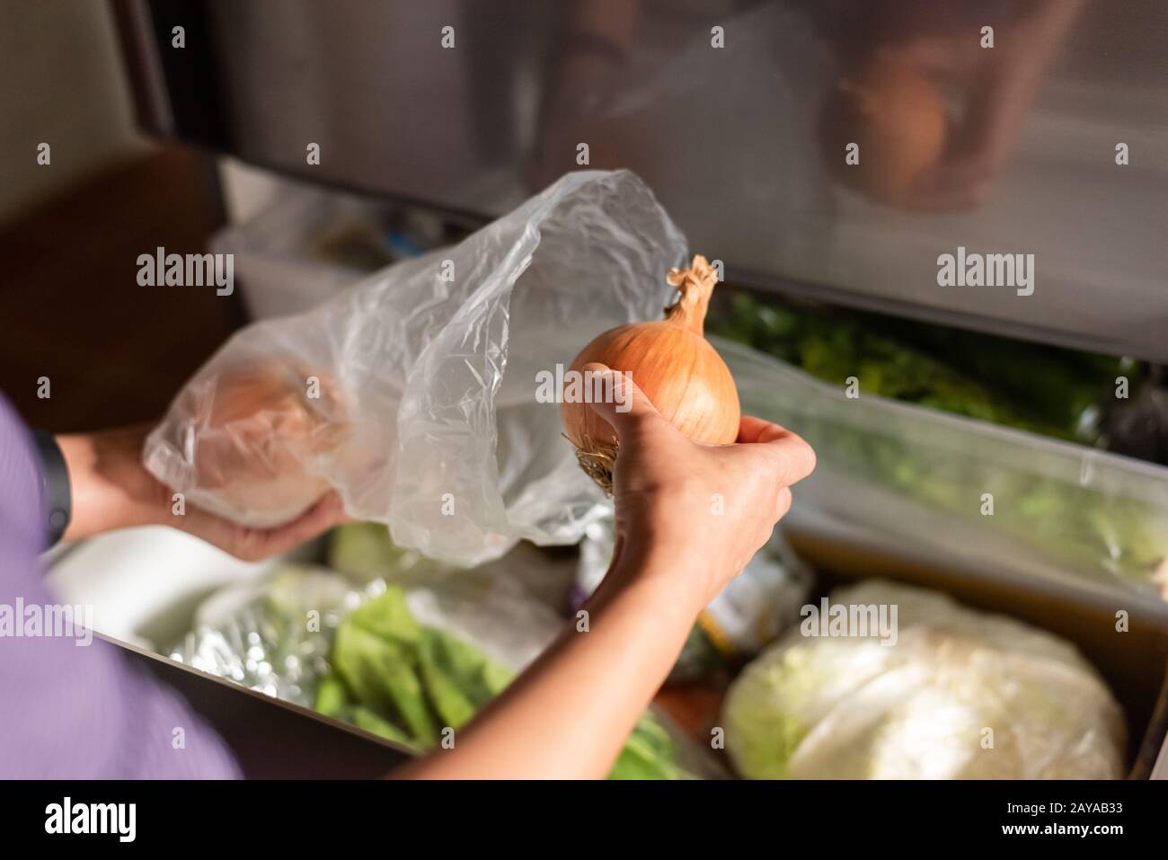 take vegetables from refrigerator Stock Photo - Alamy